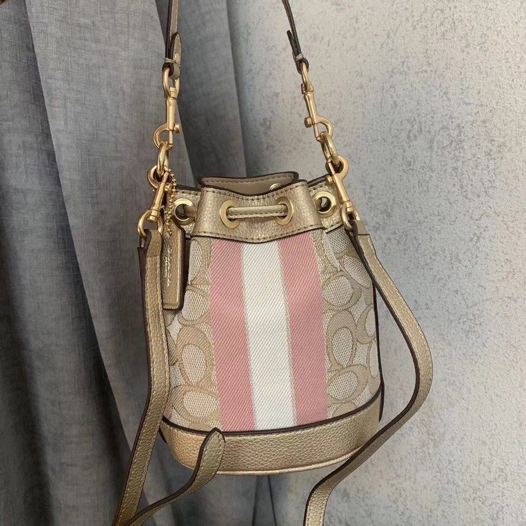 Coach New Dempsey Bucket Sling Bag, Women's Fashion, Bags & Wallets ...