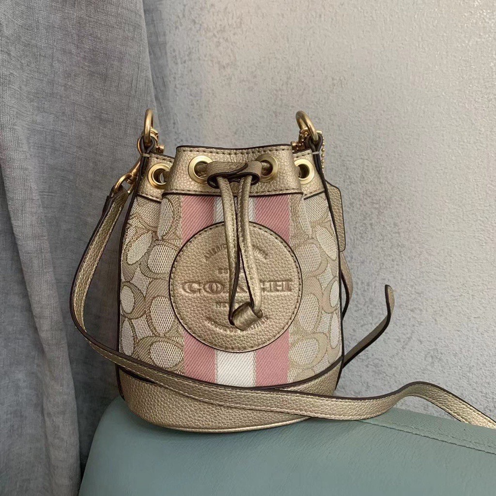 Coach New Dempsey Bucket Sling Bag, Women's Fashion, Bags & Wallets ...