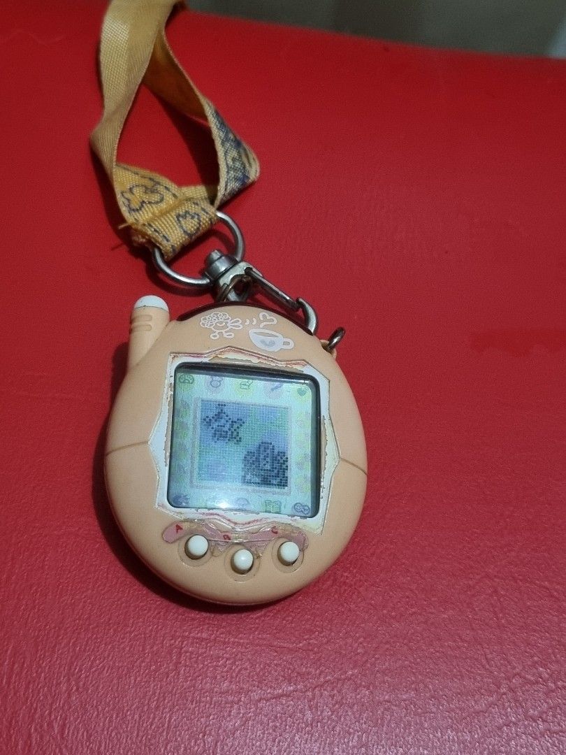 Keitai Tamagotchi Milk tea, Hobbies & Toys, Toys & Games on Carousell