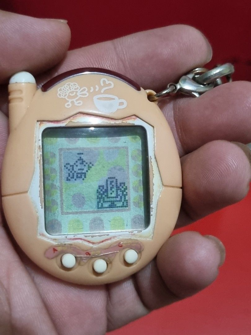 Keitai Tamagotchi Milk tea, Hobbies & Toys, Toys & Games on Carousell