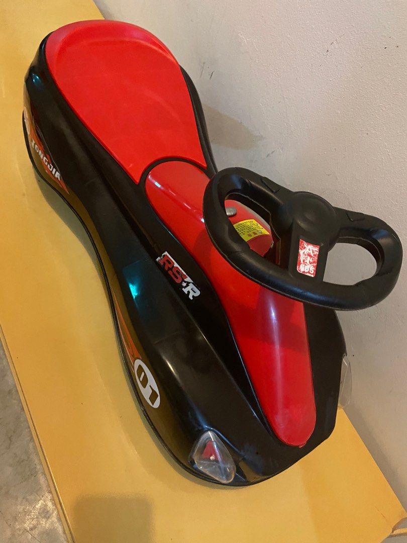 Red swivel /twisting car, Babies & Kids, Infant Playtime on Carousell