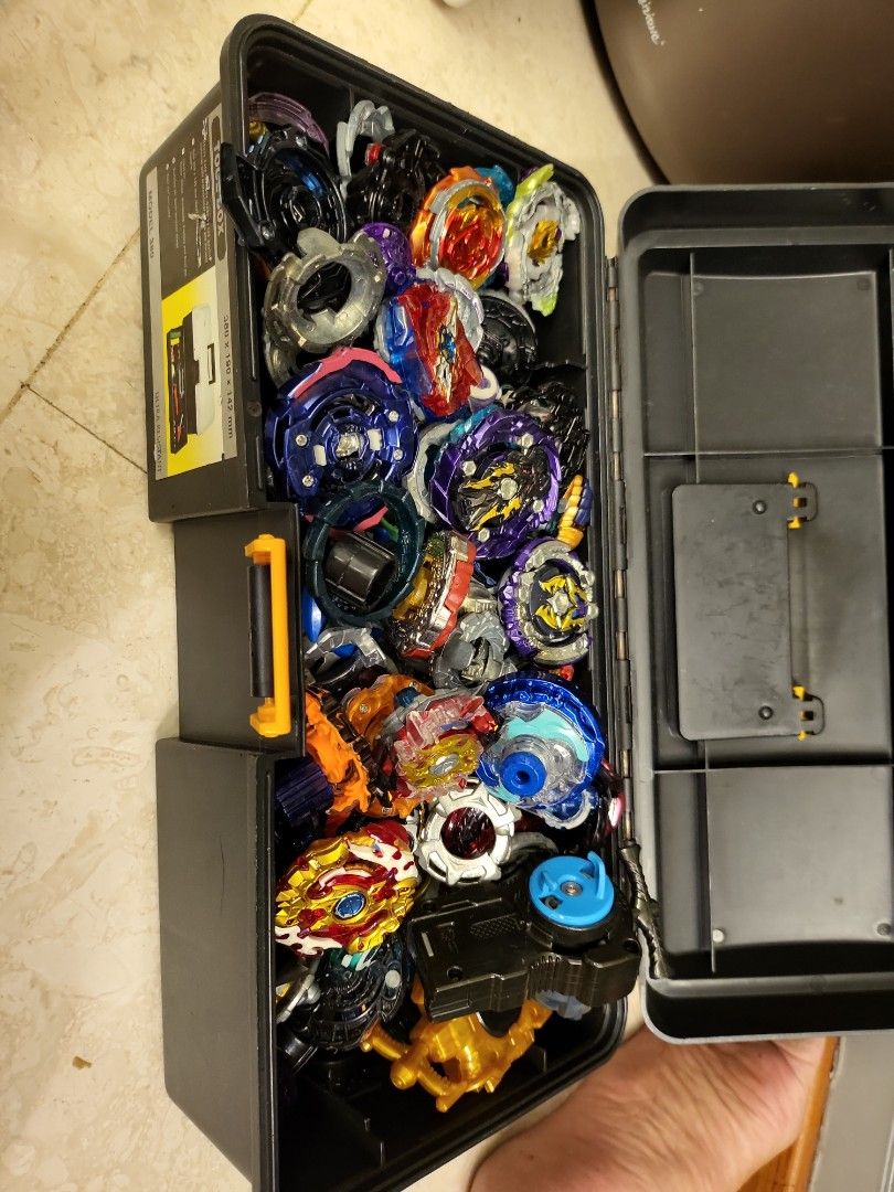 Tool box full of old beyblades, launchers and parts, Hobbies & Toys ...