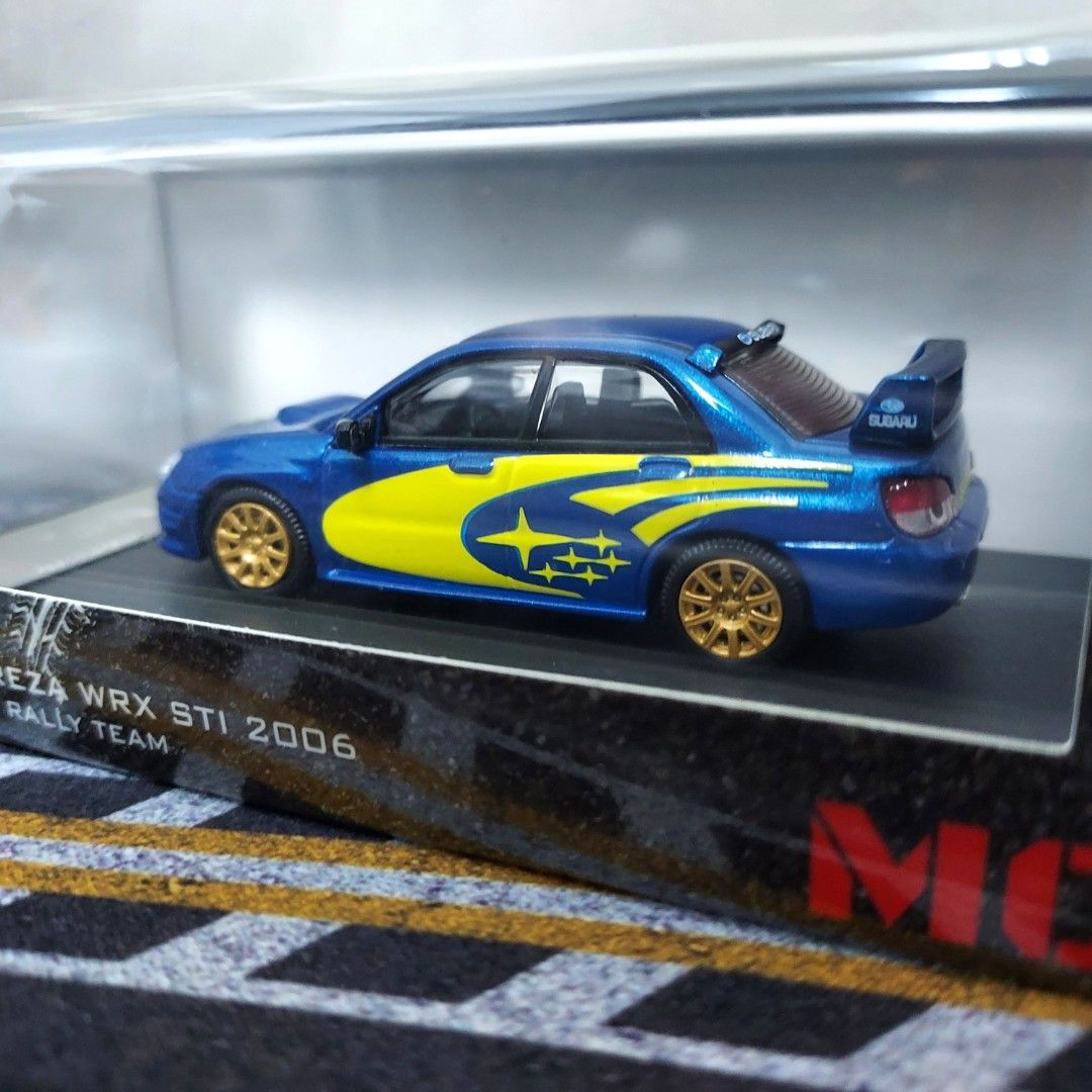 1/64 Subaru Impreza WRX STi 2006 world rally team, Hobbies & Toys, Toys & Games on Carousell