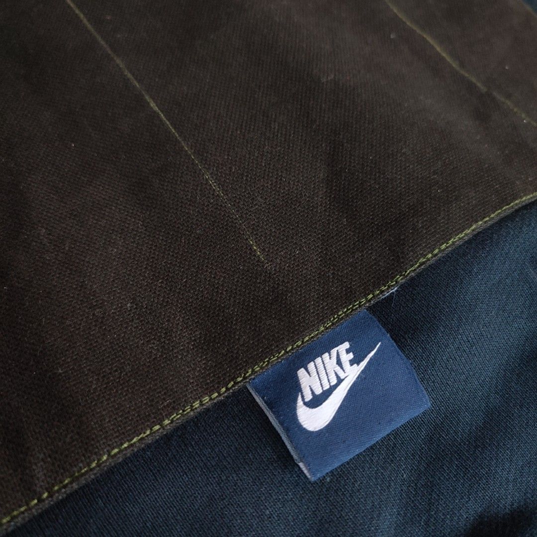 Nike reworked, Fesyen Pria, Pakaian , Atasan di Carousell