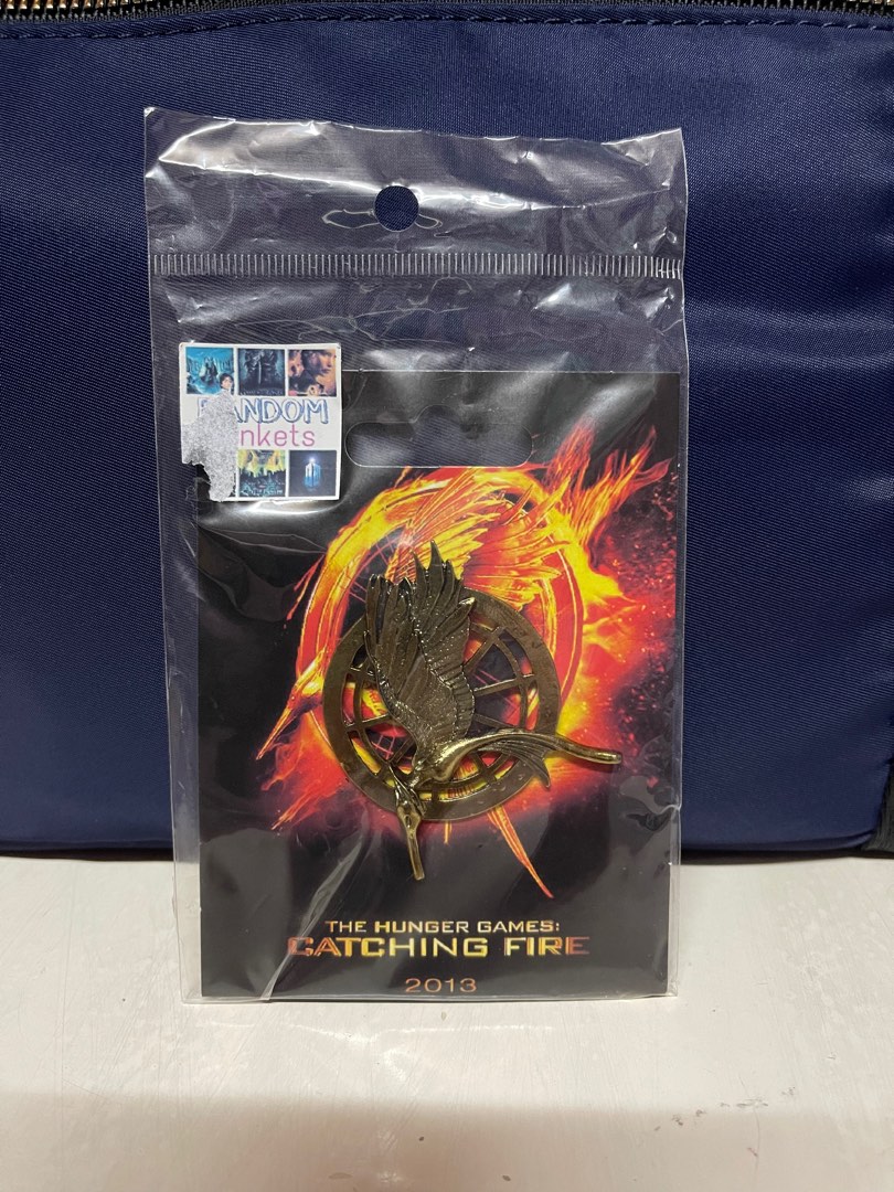 The Hunger Games Pin, Hobbies & Toys, Memorabilia & Collectibles, Fan ...
