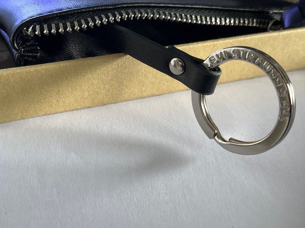 Levi coin pouch, Women's Fashion, Bags & Wallets, Purses & Pouches on ...