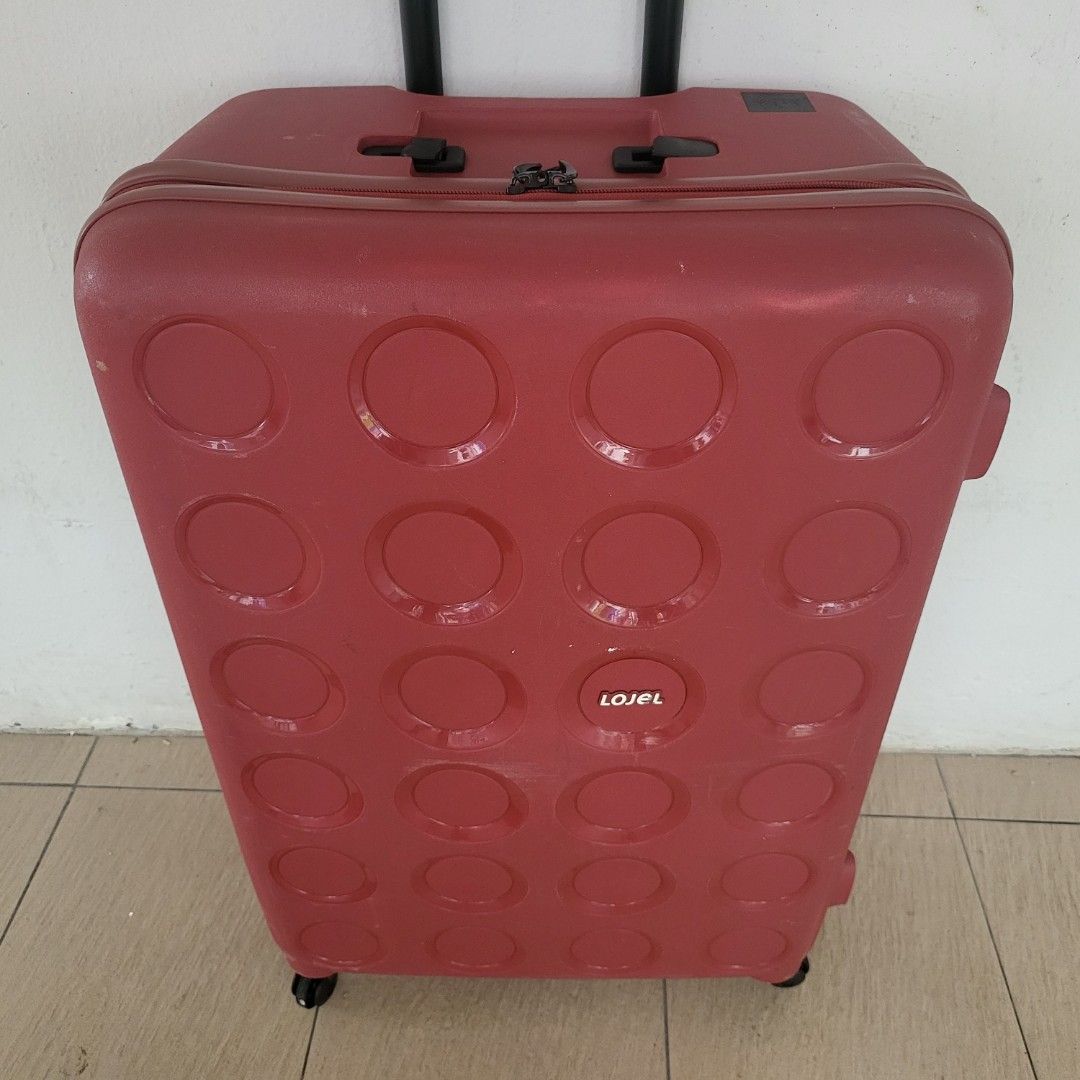Lojel 27" (hgt incl wheels) spinning 4 wheel luggage bag case. Red ...