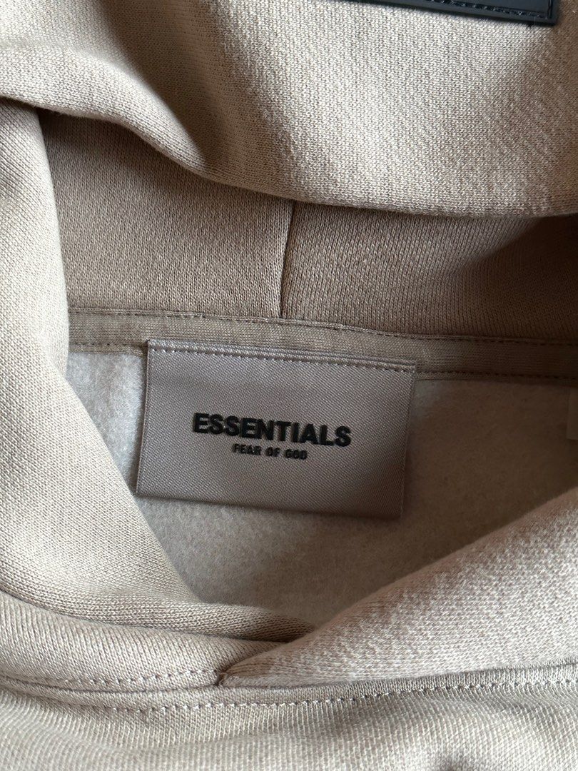 essentials front logo hoodie tan, Men's Fashion, Tops & Sets, Hoodies ...