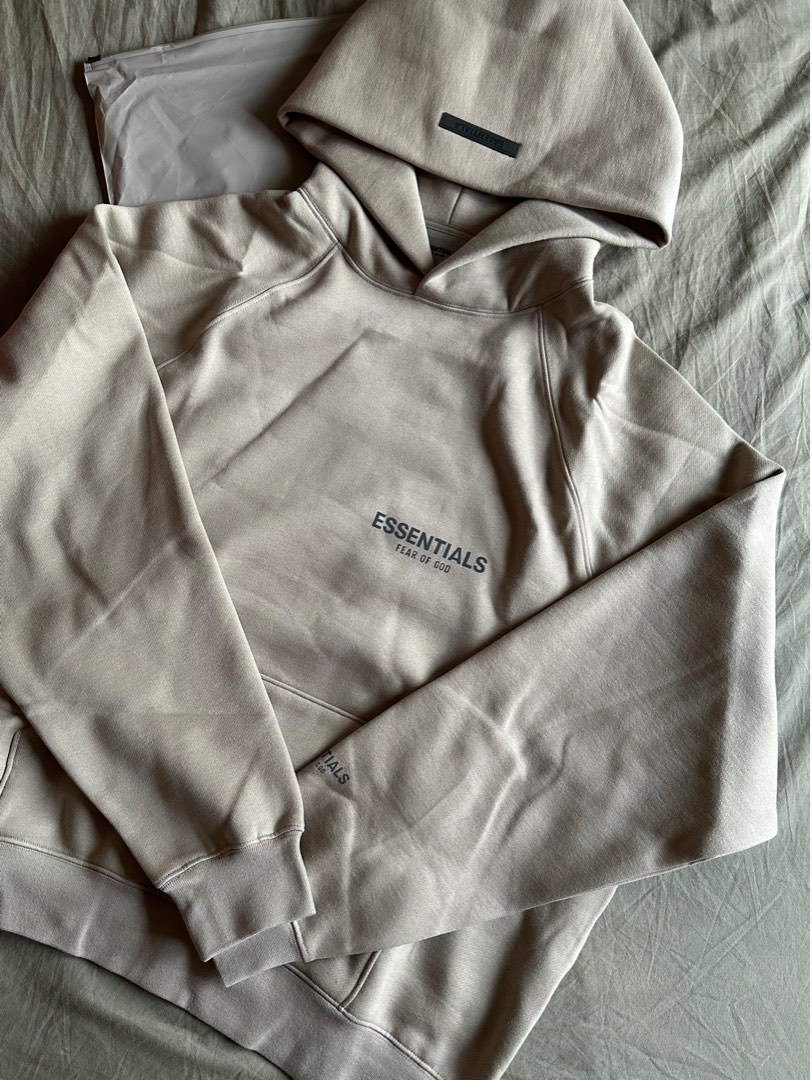 essentials front logo hoodie tan, Men's Fashion, Tops & Sets, Hoodies ...