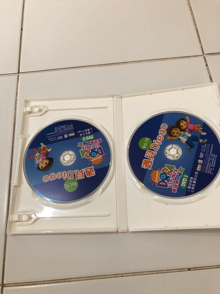 2 Dora the explorer DVDs in English and Chinese., Hobbies & Toys, Music ...
