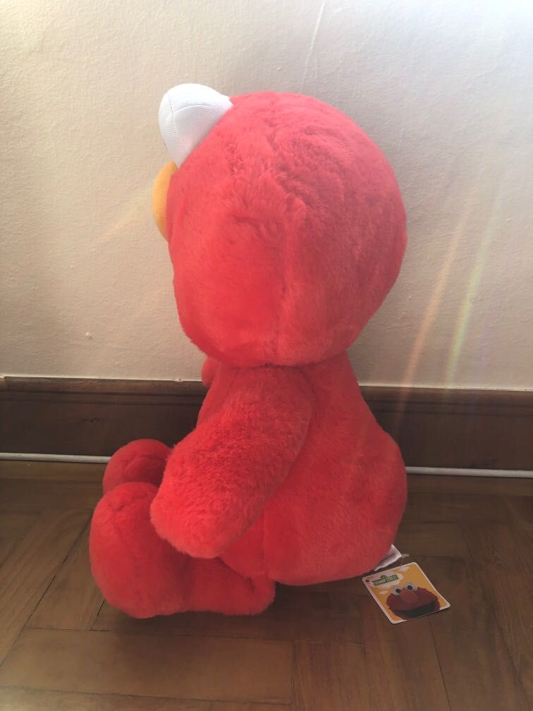Elmo plushy from timezone, Hobbies & Toys, Toys & Games on Carousell
