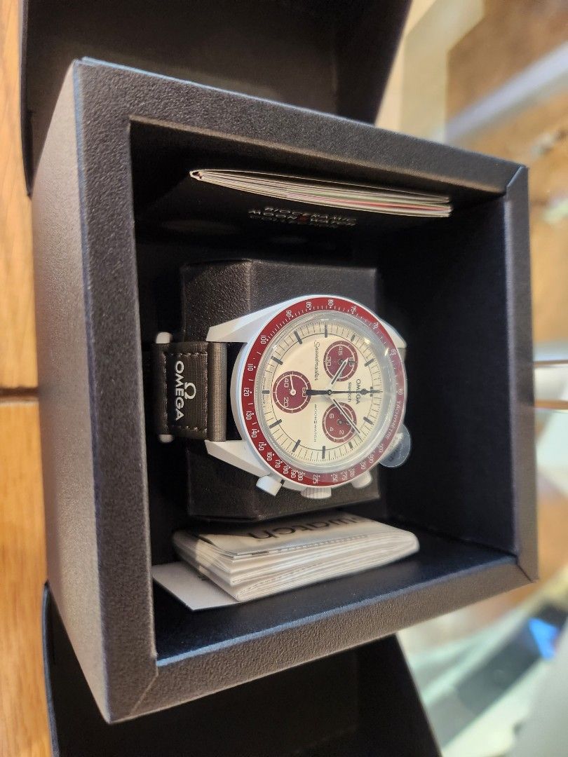 Omega x Swatch Moon Pluto watch, Luxury, Watches on Carousell