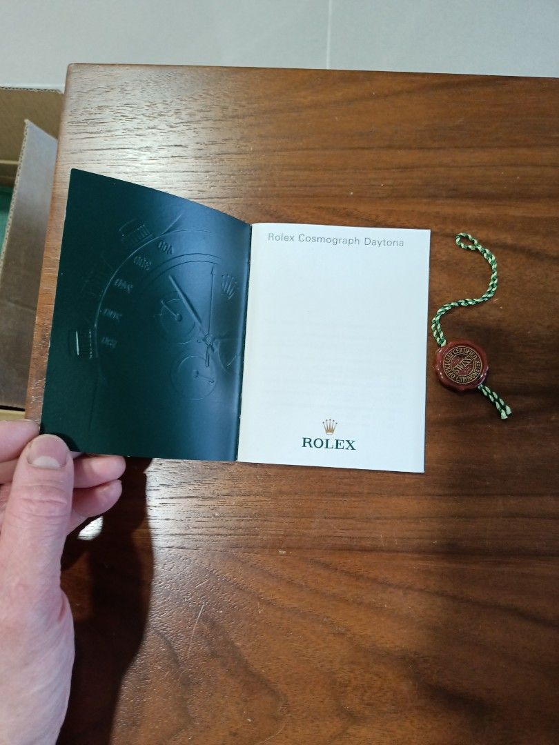 Rolex Daytona booklet and Red tags, Luxury, Watches on Carousell