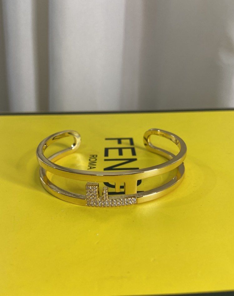 Fendi open hollow gold bangle pre order, Women's Fashion, Jewelry ...