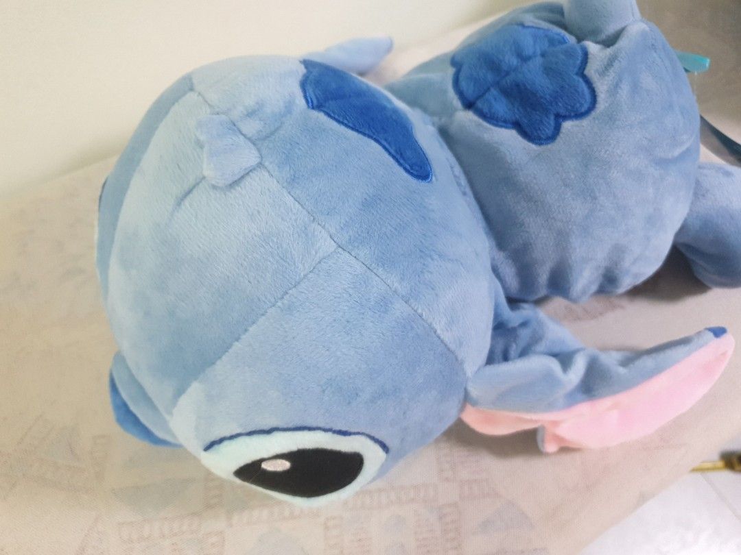 Stitch laying down plush, Hobbies & Toys, Toys & Games on Carousell