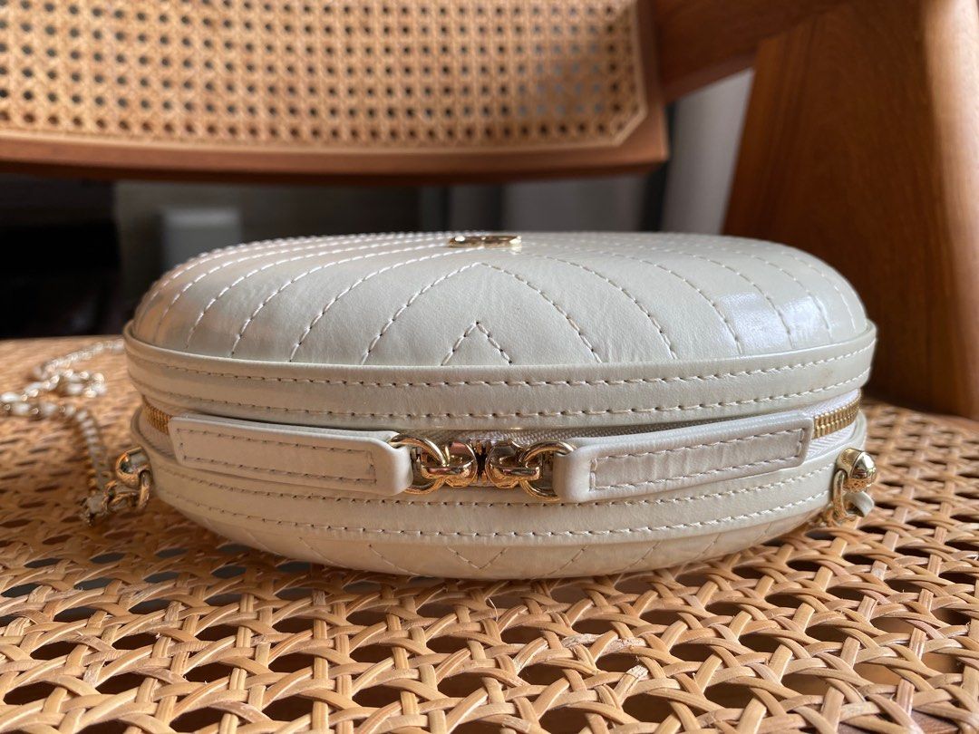 Authentic Chanel Oval Shape Sling, Luxury, Bags & Wallets on Carousell