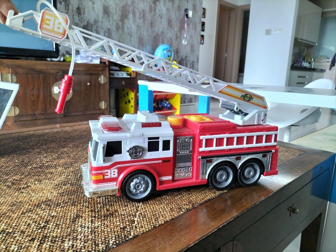 Toy r us Big fire truck with sound and water spray, Hobbies & Toys ...