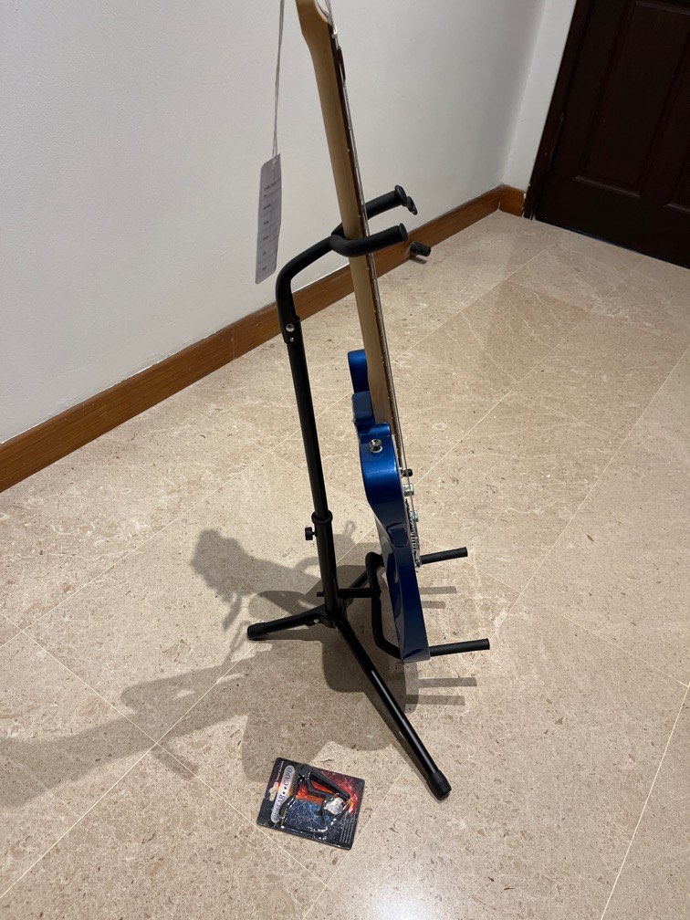 Guitar stand and capo, Hobbies & Toys, Music & Media, Music Accessories ...