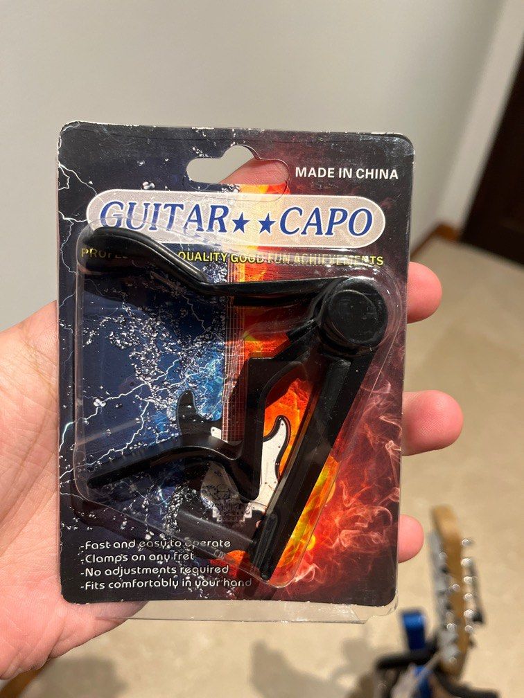 Guitar stand and capo, Hobbies & Toys, Music & Media, Music Accessories ...