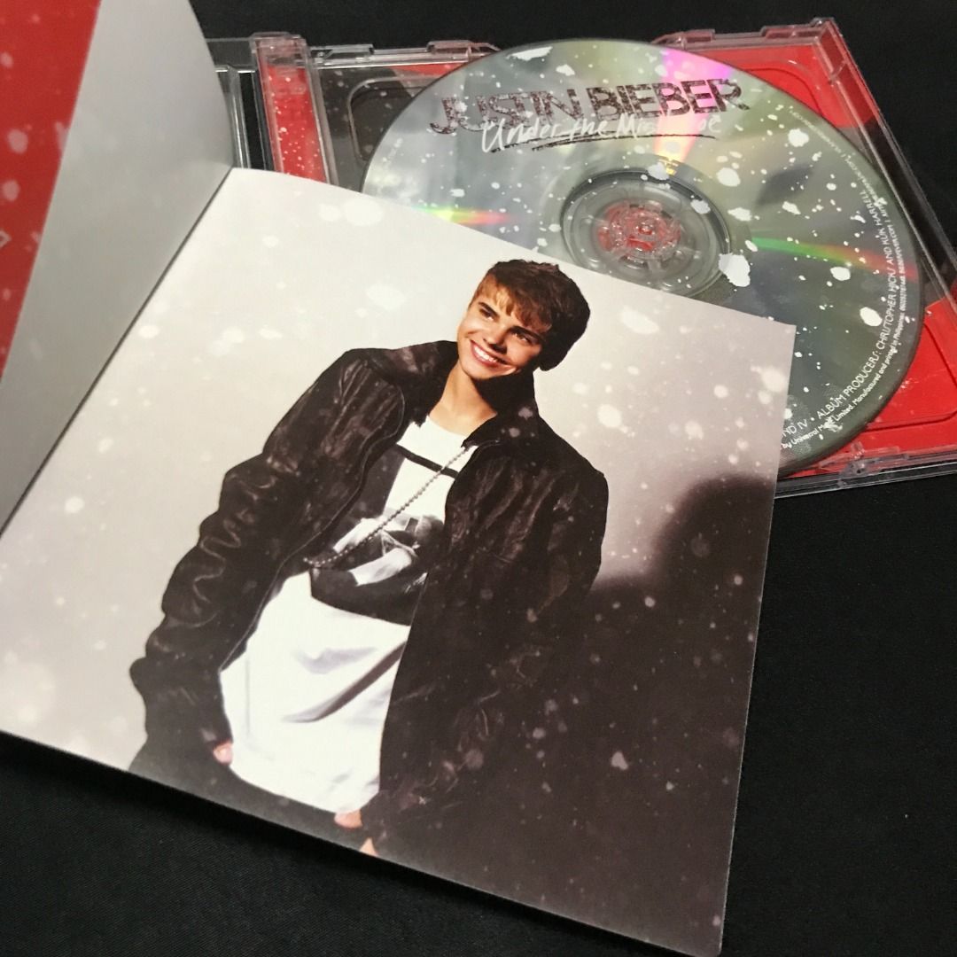 Justin Bieber - Under the Mistletoe (Deluxe 2 CD), Hobbies & Toys ...