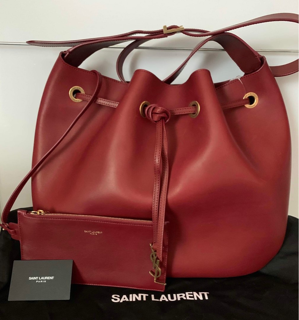 YSL bucket bag, Luxury, Bags & Wallets on Carousell