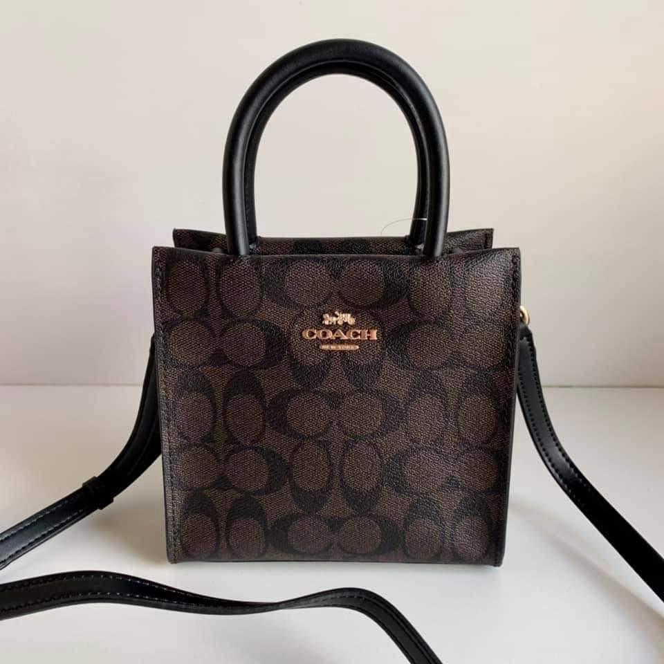 Coach Mini Cally in Signature Canvas, Women's Fashion, Bags & Wallets ...