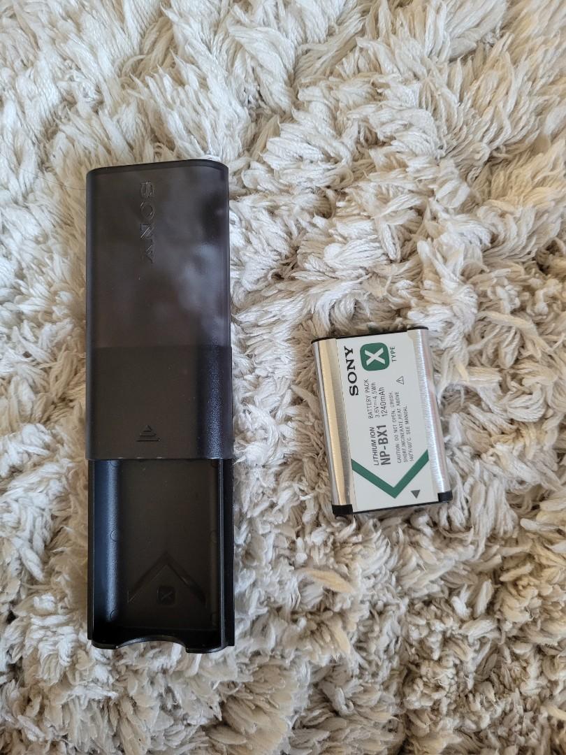 sony rx100 charger and battery, Photography, Cameras on Carousell