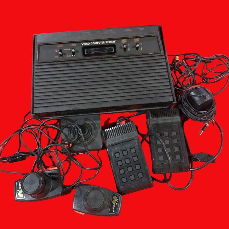 ATARI 2600 mid-1980s with joystick, controllers and pad, Video Gaming ...