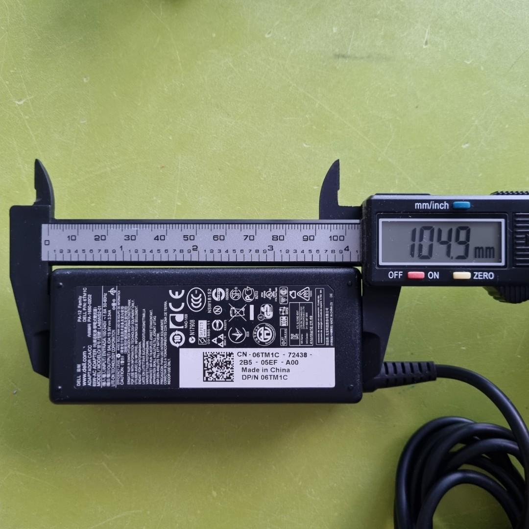 Compact Dell AC/DC 65W Laptop Power Adapter on Carousell