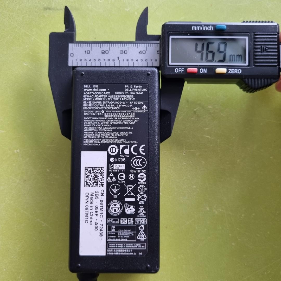 Compact Dell AC/DC 65W Laptop Power Adapter on Carousell