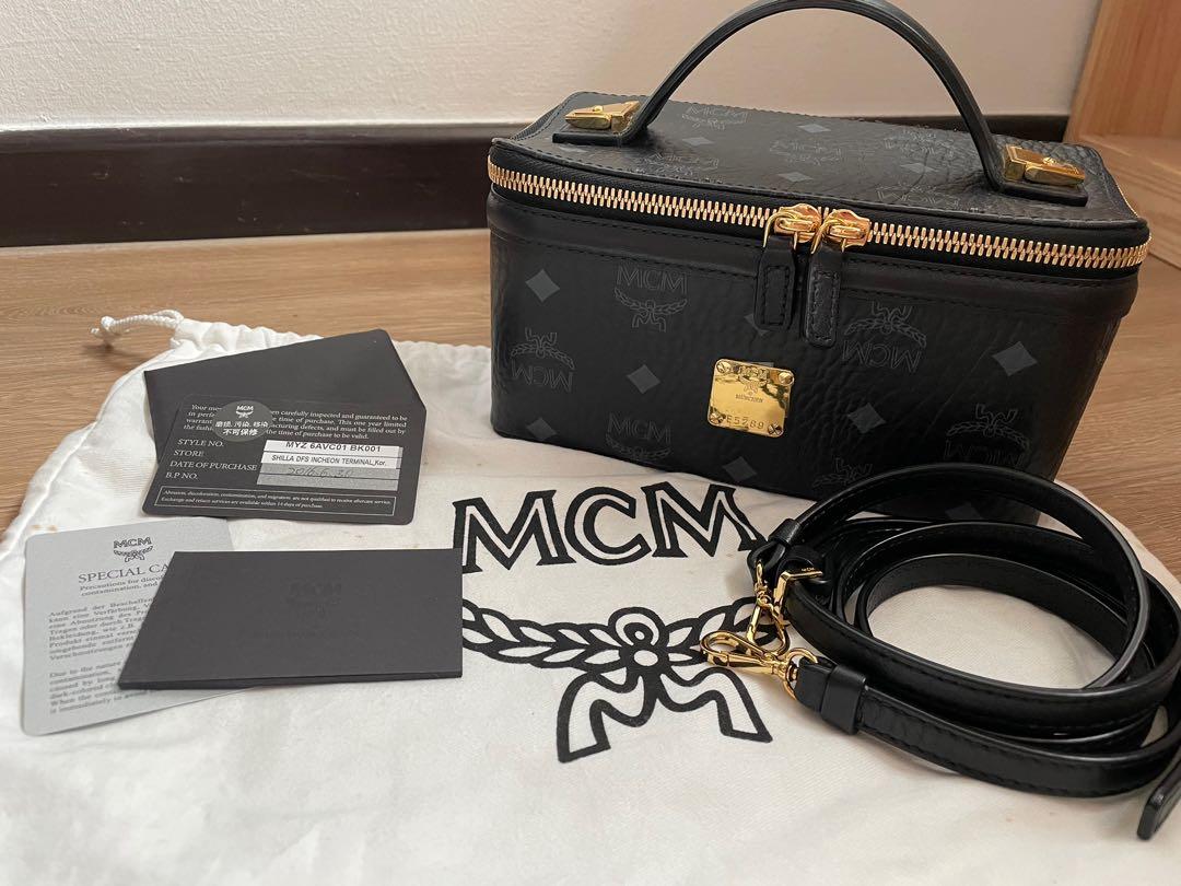 MCM rock star vanity case in black/gold, Women's Fashion, Bags ...