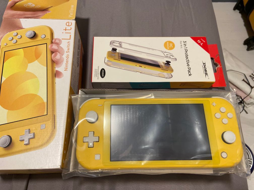 New Nintendo switch lite yellow, Video Gaming, Video Game Consoles ...