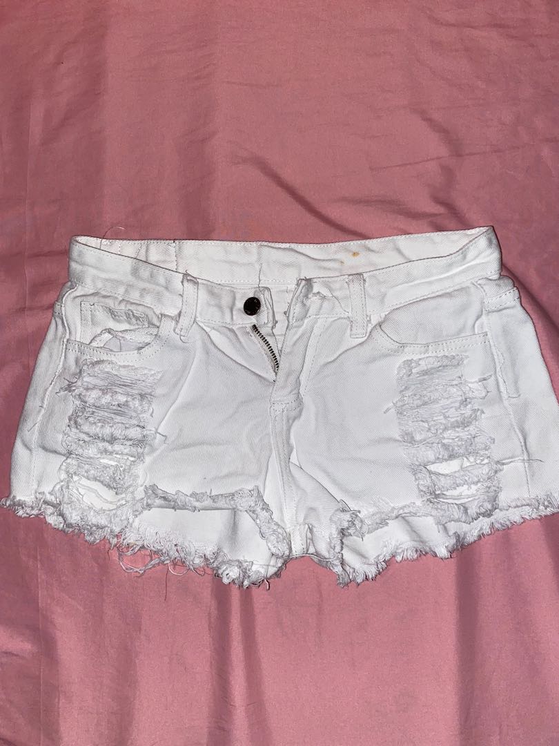 White tattered short shorts, Women's Fashion, Bottoms, Shorts on Carousell