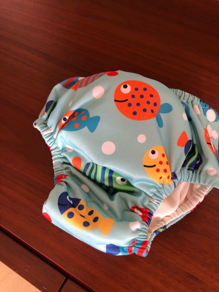Snugly Fit baby swim diaper Happy Fish, Babies & Kids, Babies & Kids ...