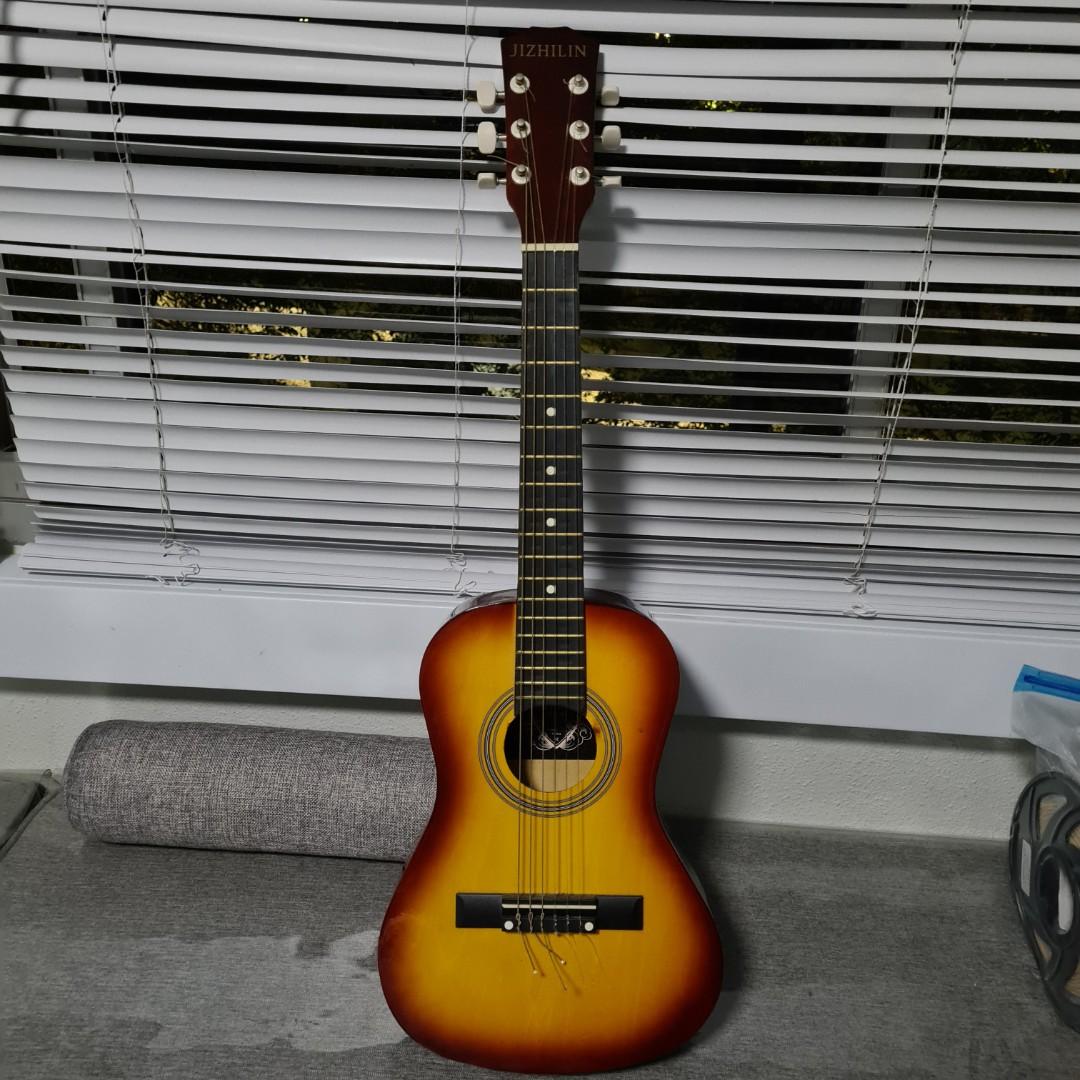 Used but well maintain 30 inch guitar with classical strings, Hobbies ...