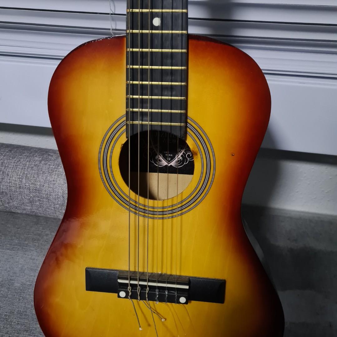Used but well maintain 30 inch guitar with classical strings, Hobbies ...