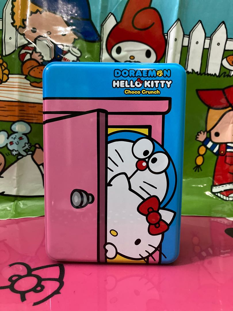 Doraemon Hello kitty can, Hobbies & Toys, Toys & Games on Carousell