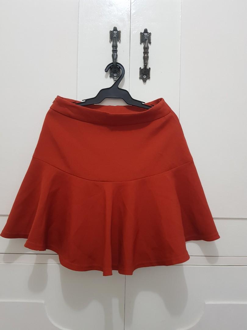 Rust colored skirt, Women's Fashion, Bottoms, Skirts on Carousell