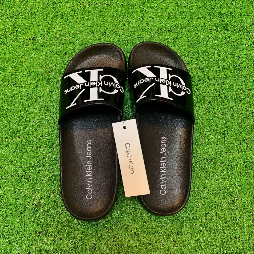 CK ORIGINAL SLIDES, Women's Fashion, Footwear, Flats & Sandals on Carousell