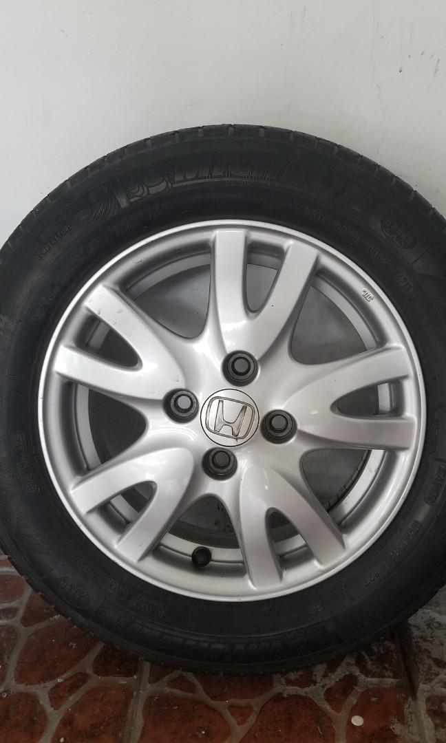 Honda stock 14 inches mags and tires with gutter marks, Car Parts ...