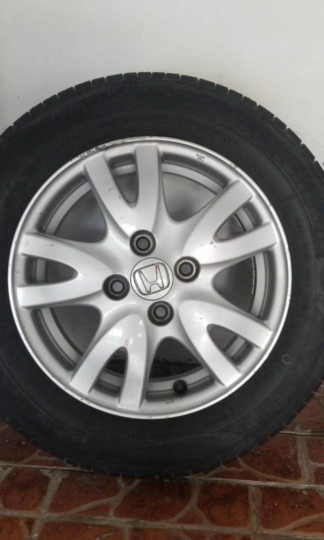Honda stock 14 inches mags and tires with gutter marks, Car Parts ...