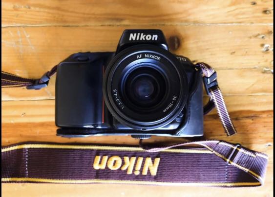 Nikon F70 with 35-70mm lens, Photography, Cameras on Carousell