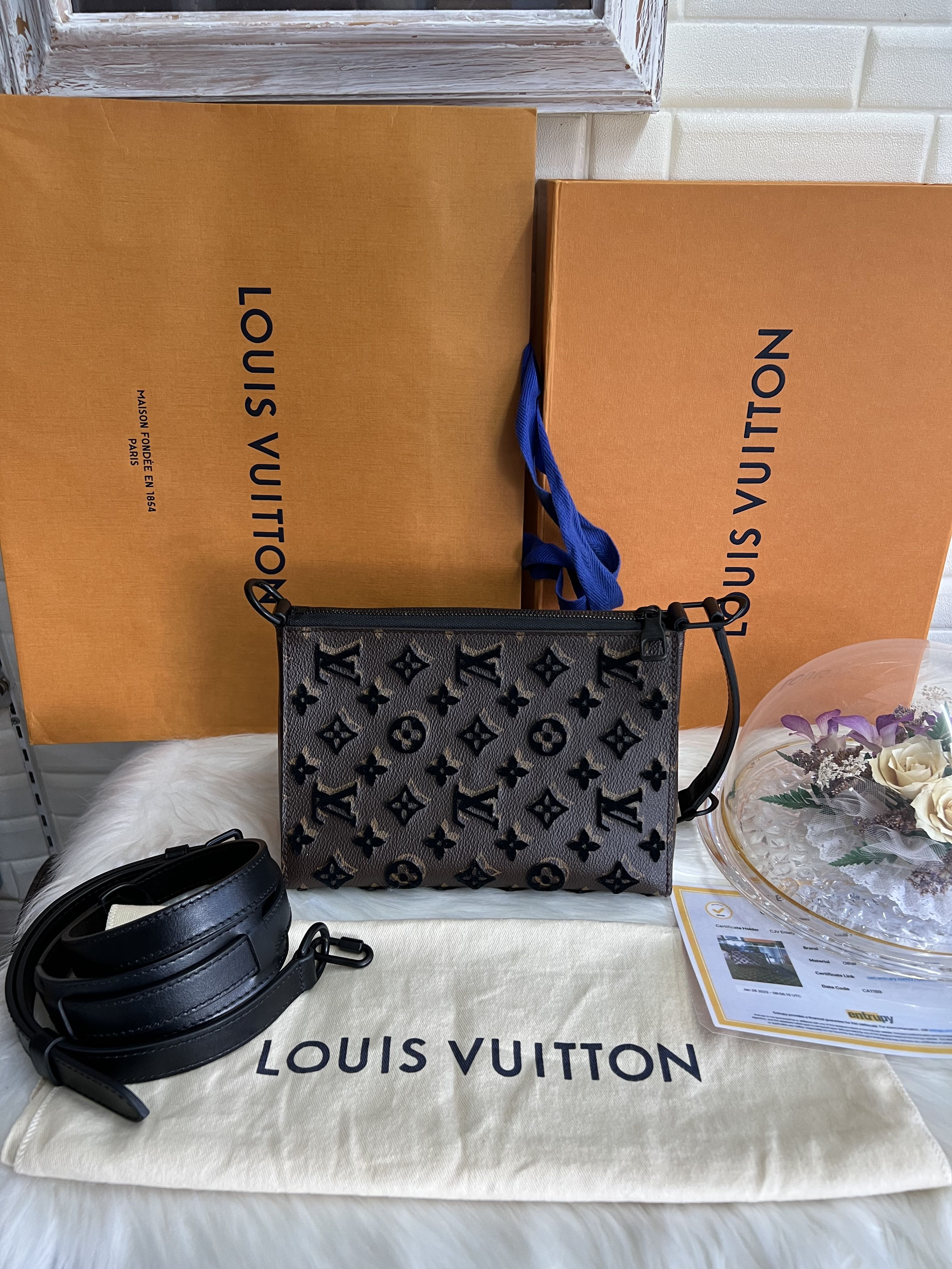 Authentic Louis Vuitton Triangle Messenger Monogram Tuffetage Black ...