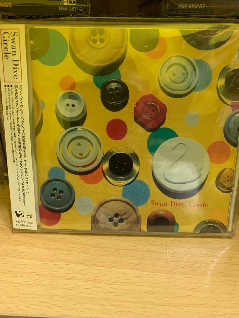 Swan dive-circle, Hobbies & Toys, Music & Media, CDs & DVDs on Carousell