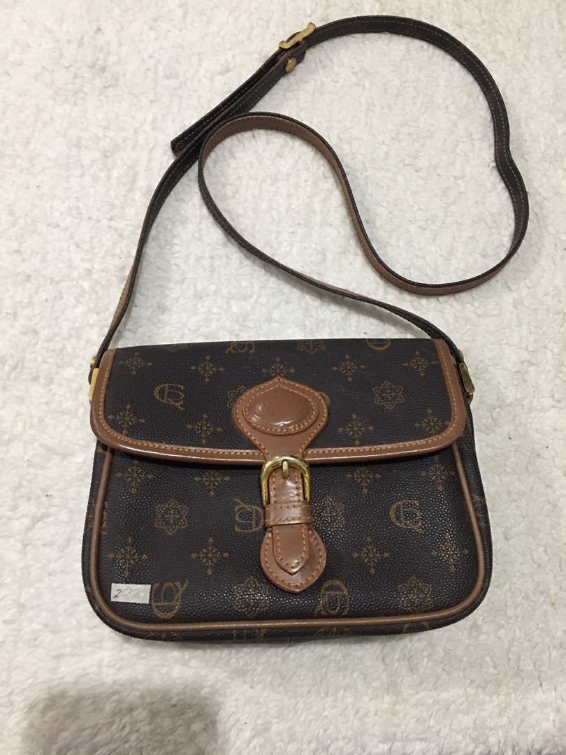 Christian Raguerre sling, Luxury, Bags & Wallets on Carousell