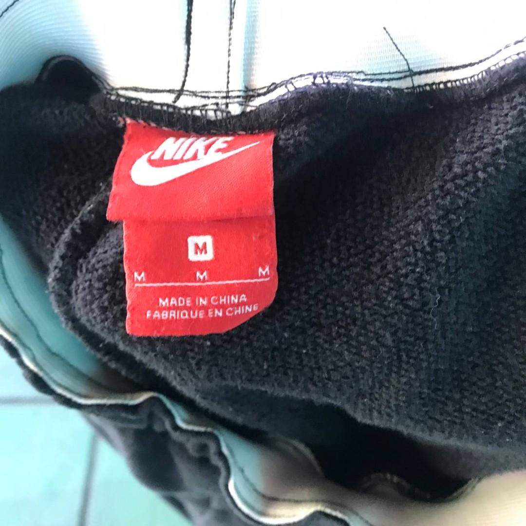 NIKE RED TAG, Men's Fashion, Bottoms, Joggers on Carousell