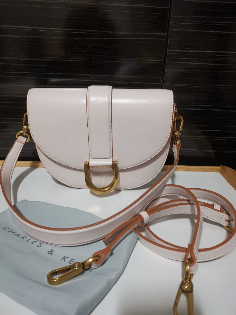 Charles and keith cross body saddle bag, Women's Fashion, Bags & Wallets, Cross-body Bags on ...
