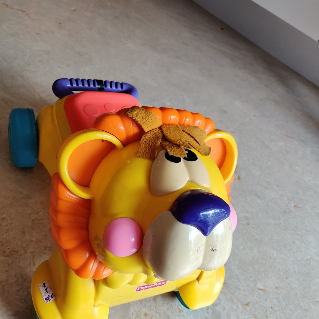 Fisher Price push toy lion, Babies & Kids, Infant Playtime on Carousell