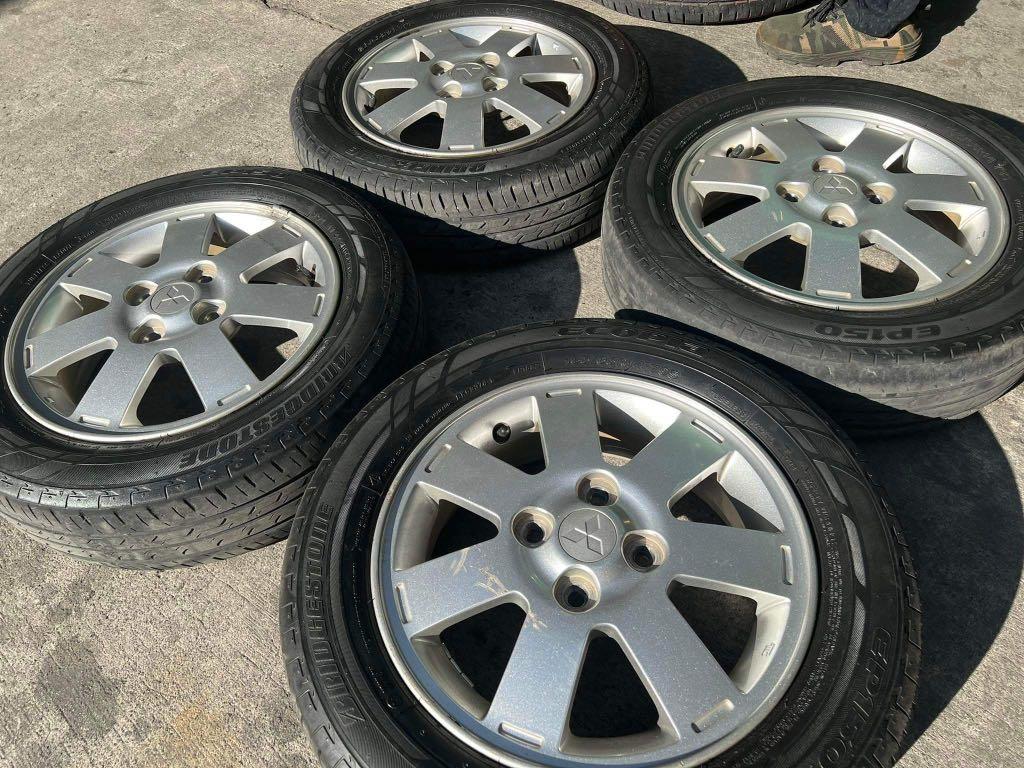 14” Mitsubishi Mirage mags used 4Holes pcd 100 with 165-65-r14 ...