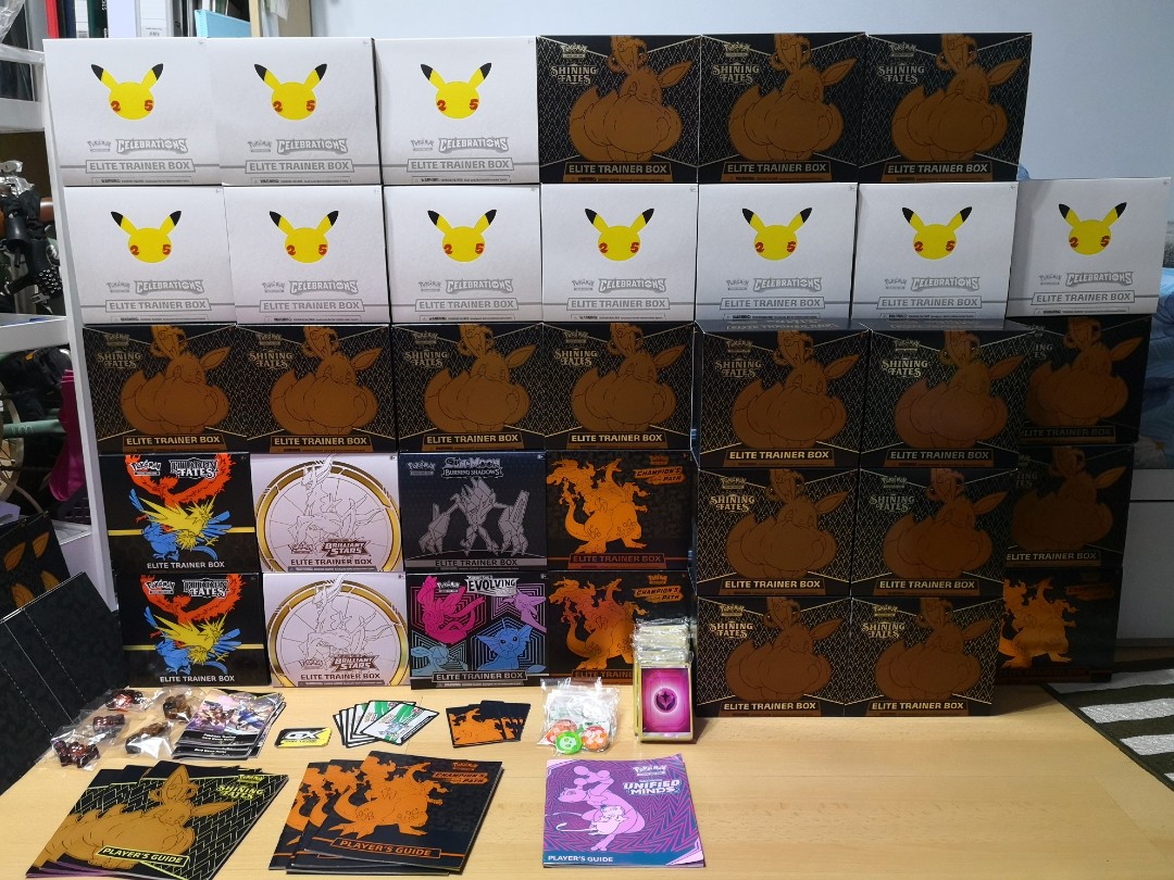 Opened Elite Trainer Boxes ETB sleeves energy dice charizard eevee ...